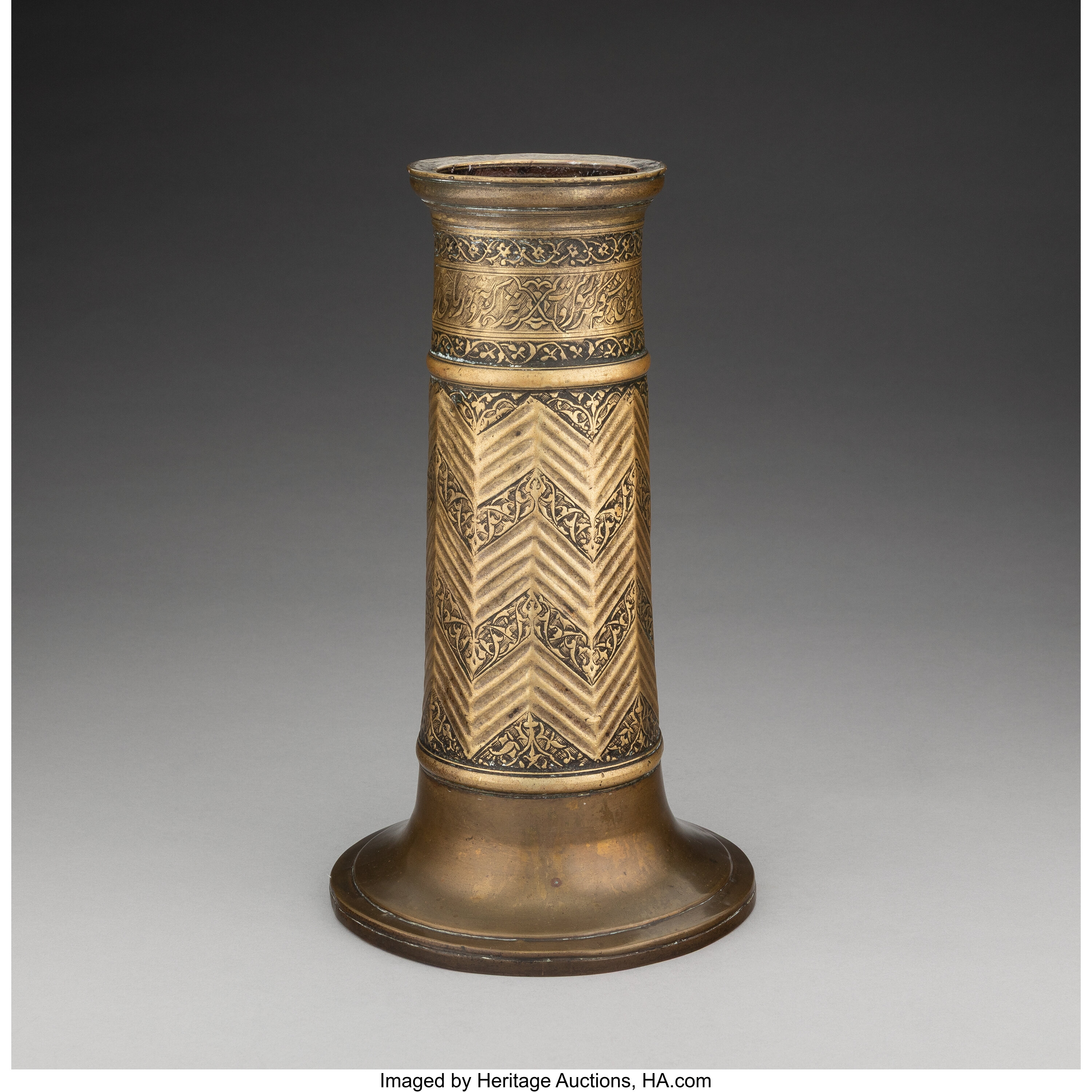 A Safavid Brass Torch Stand, 14th century. 11-1/2 x 6-5/8 inches | Lot ...