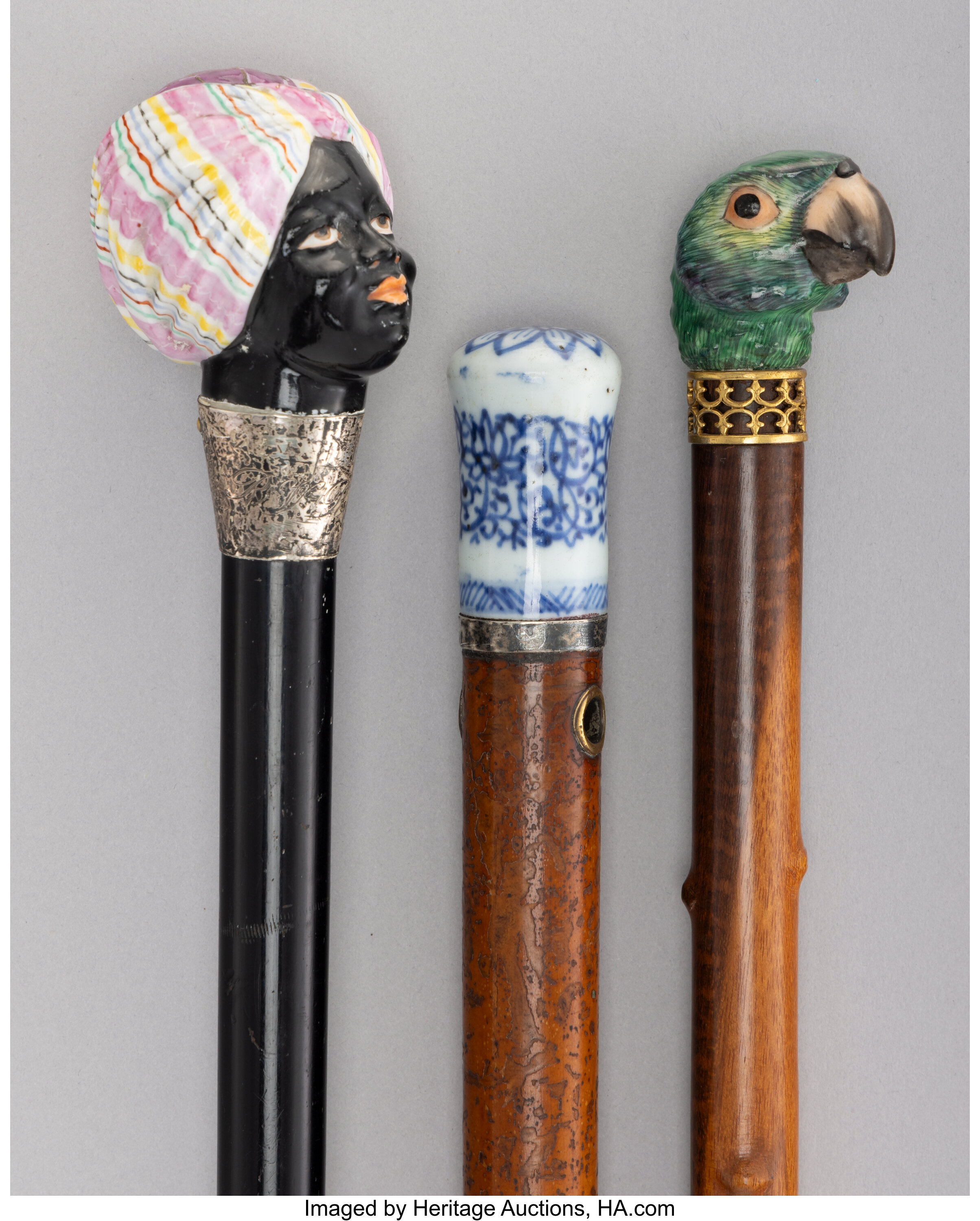 Three Glazed Ceramic-Handled Canes, circa 1900. 35-5/8 x 1 x 1-1/2 ...