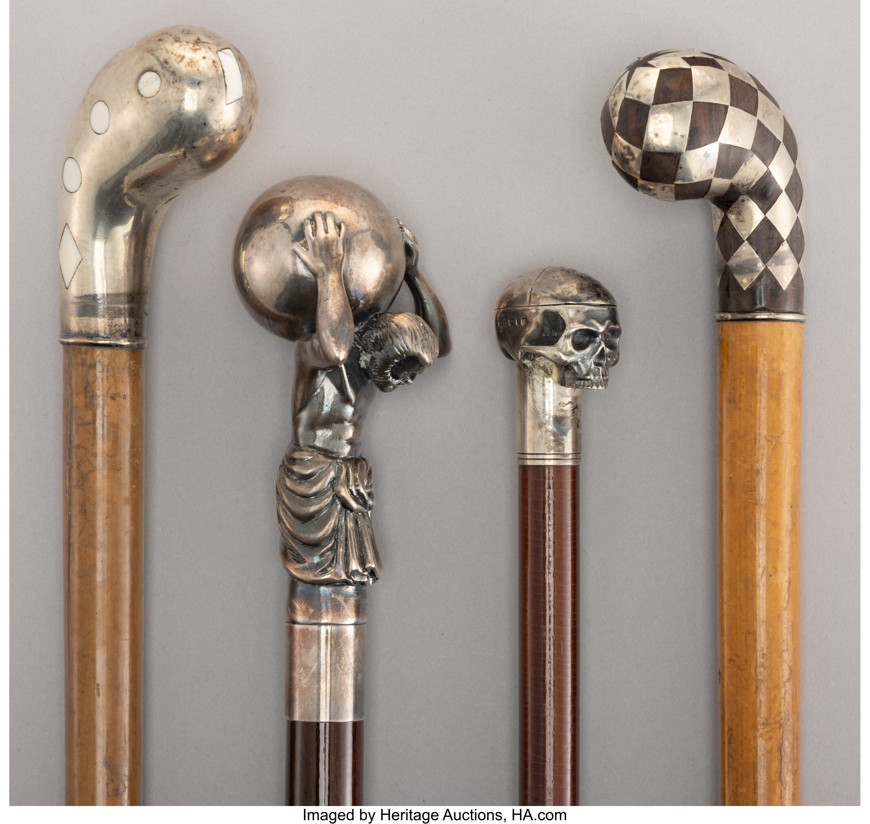 A Group of Four Silver-Mounted Wood Canes. Marks to largest: R, | Lot ...