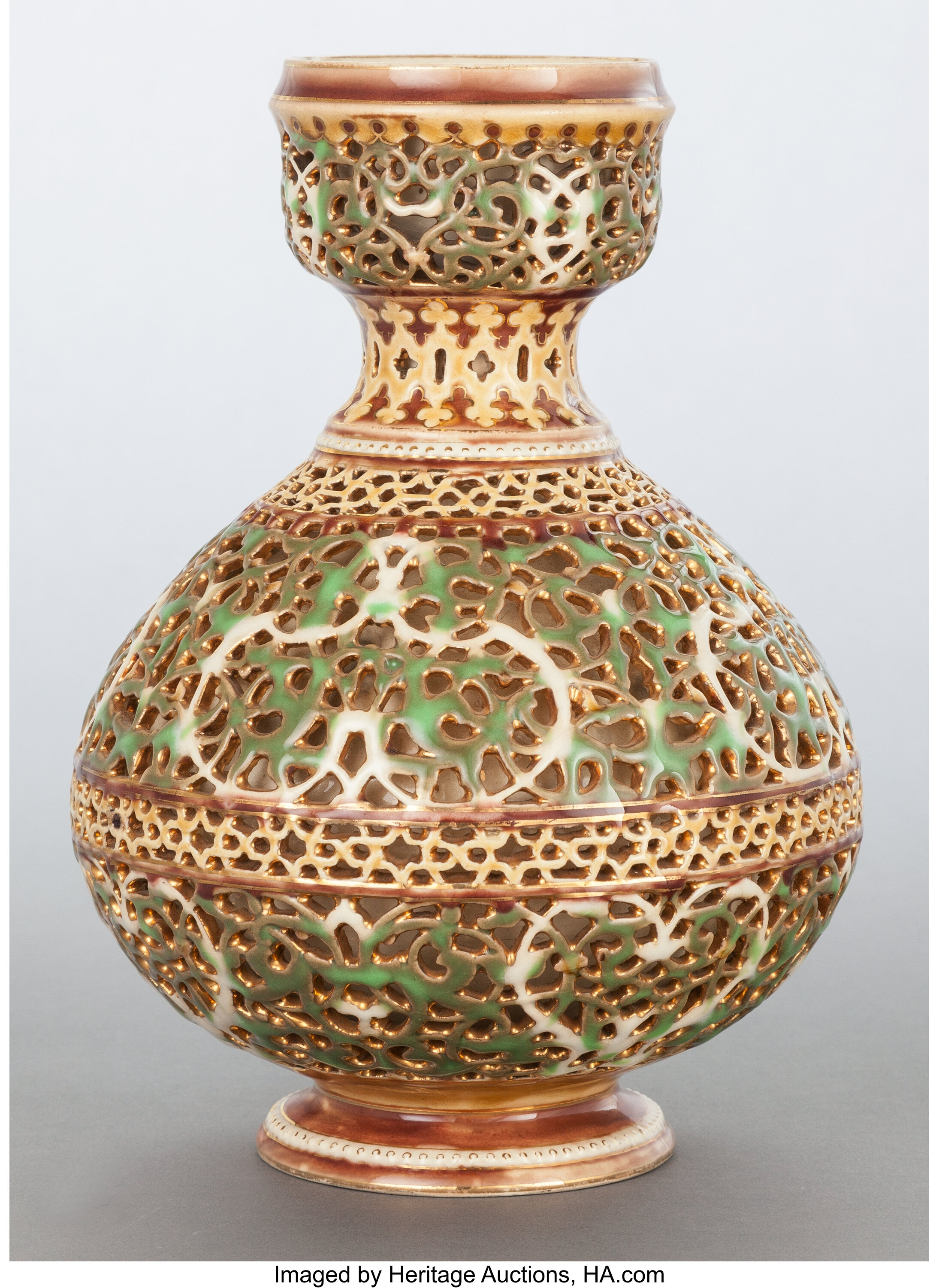 A ZSOLNAY PIERCED RETICULATED PORCELAIN VASE . 20th century. Marks ...