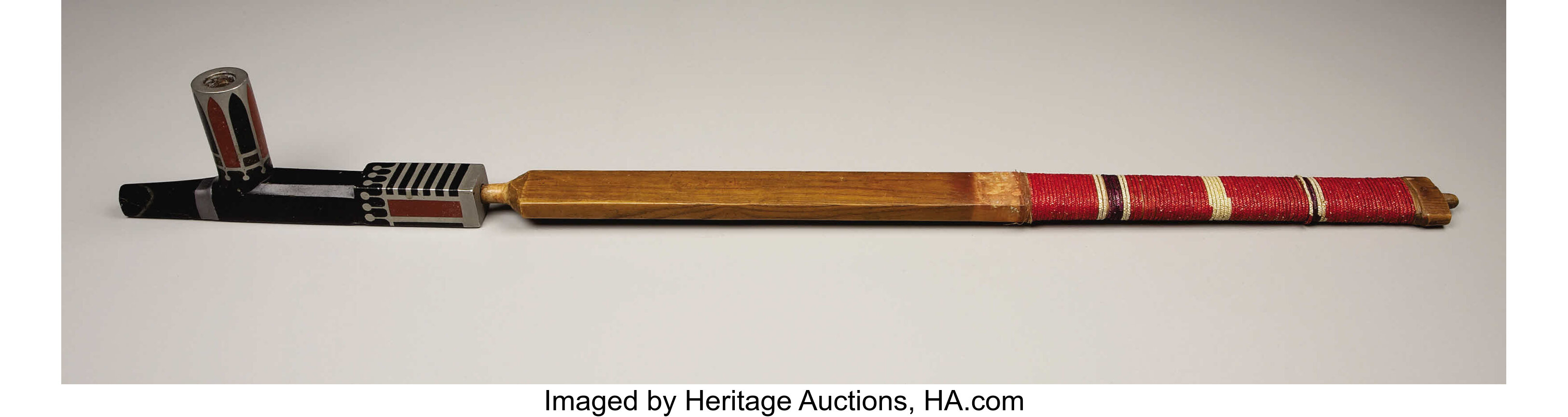 A SIOUX WOOD PIPE STEM AND A CHIPPEWA BLACKSTONE PIPE BOWL. c. | Lot ...