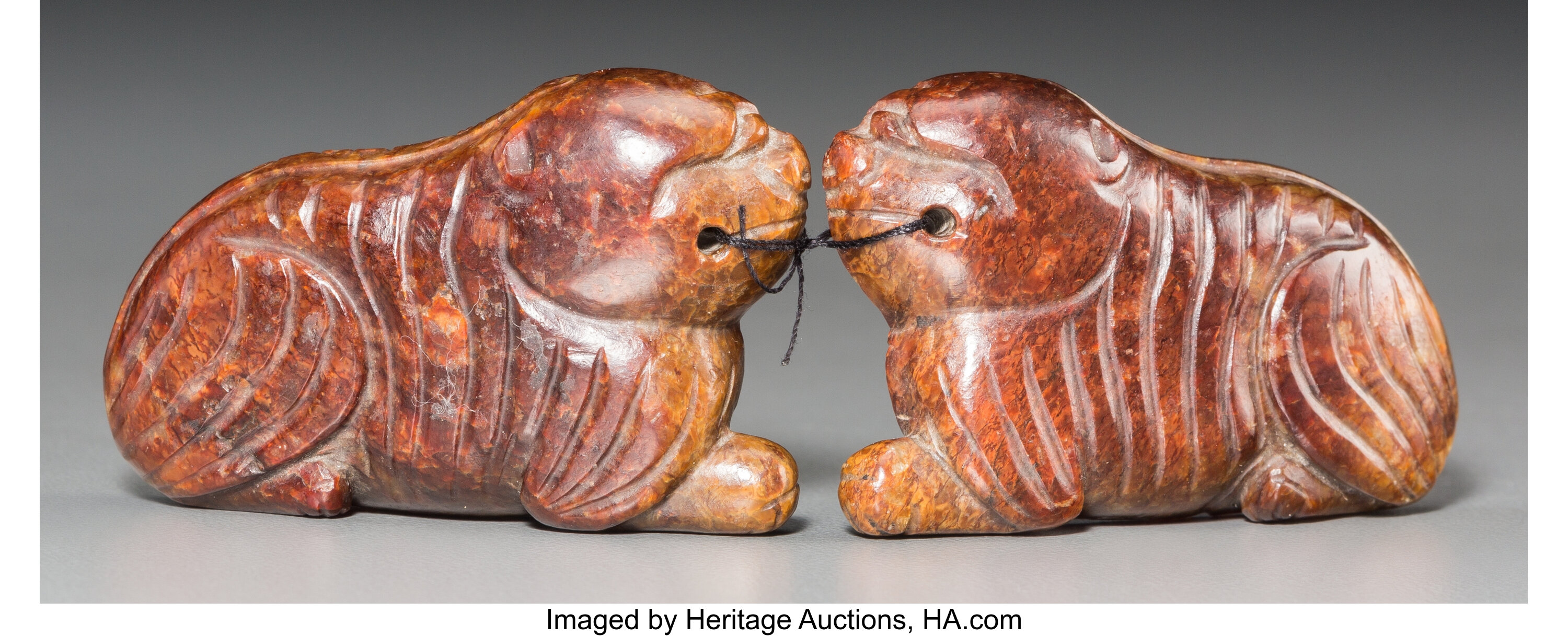 A Chinese Carved Brown Jade Tiger Tally, Ming Dynasty. 1-1/4 inches ...