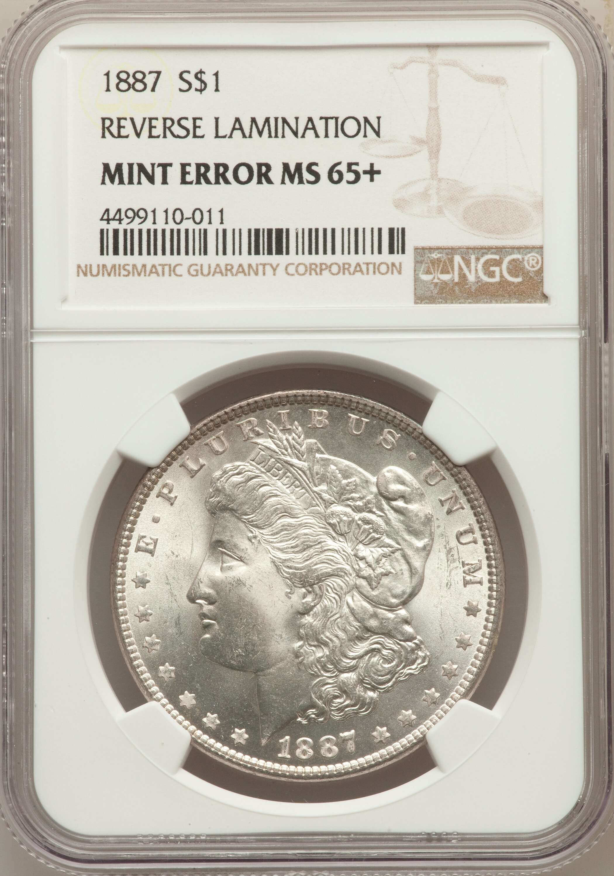 1887 $1 Morgan Dollar -- Reverse Lamination -- MS65+ NGC.... Errors ...