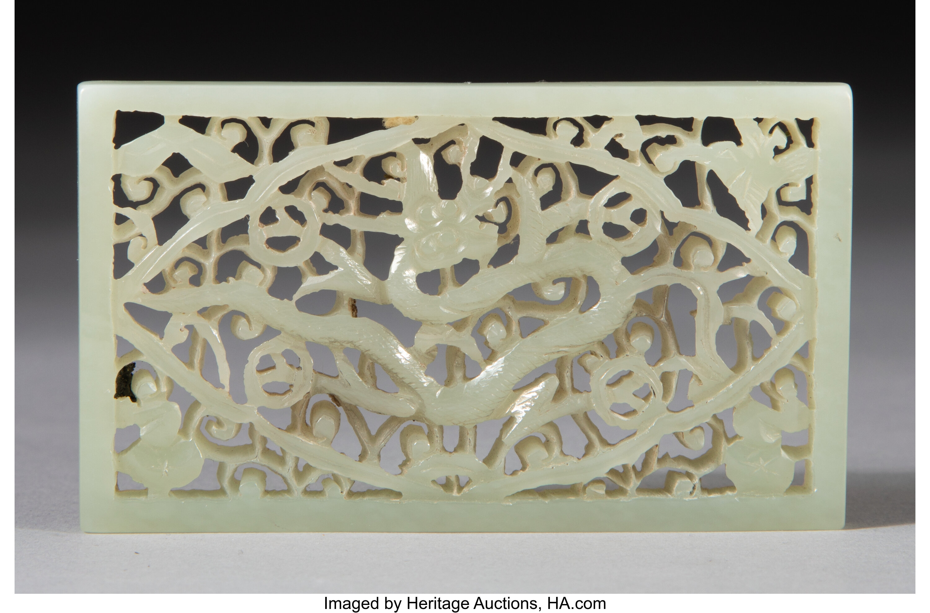 A Chinese Carved Celadon Jade Reticulated Dragon Plaque. 1-3/4 x 3 ...