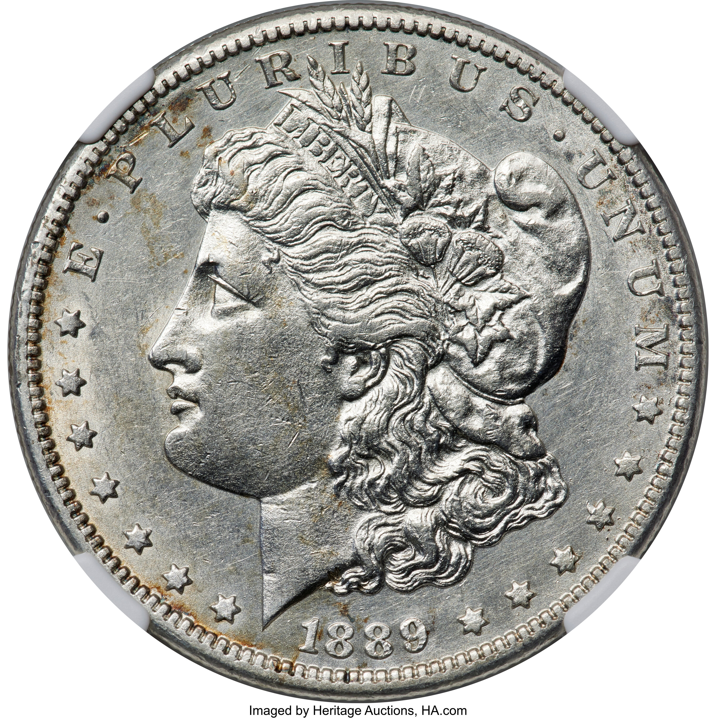 1889-CC $1 -- Cleaned -- NGC Details. AU. From a minuscule mintage ...