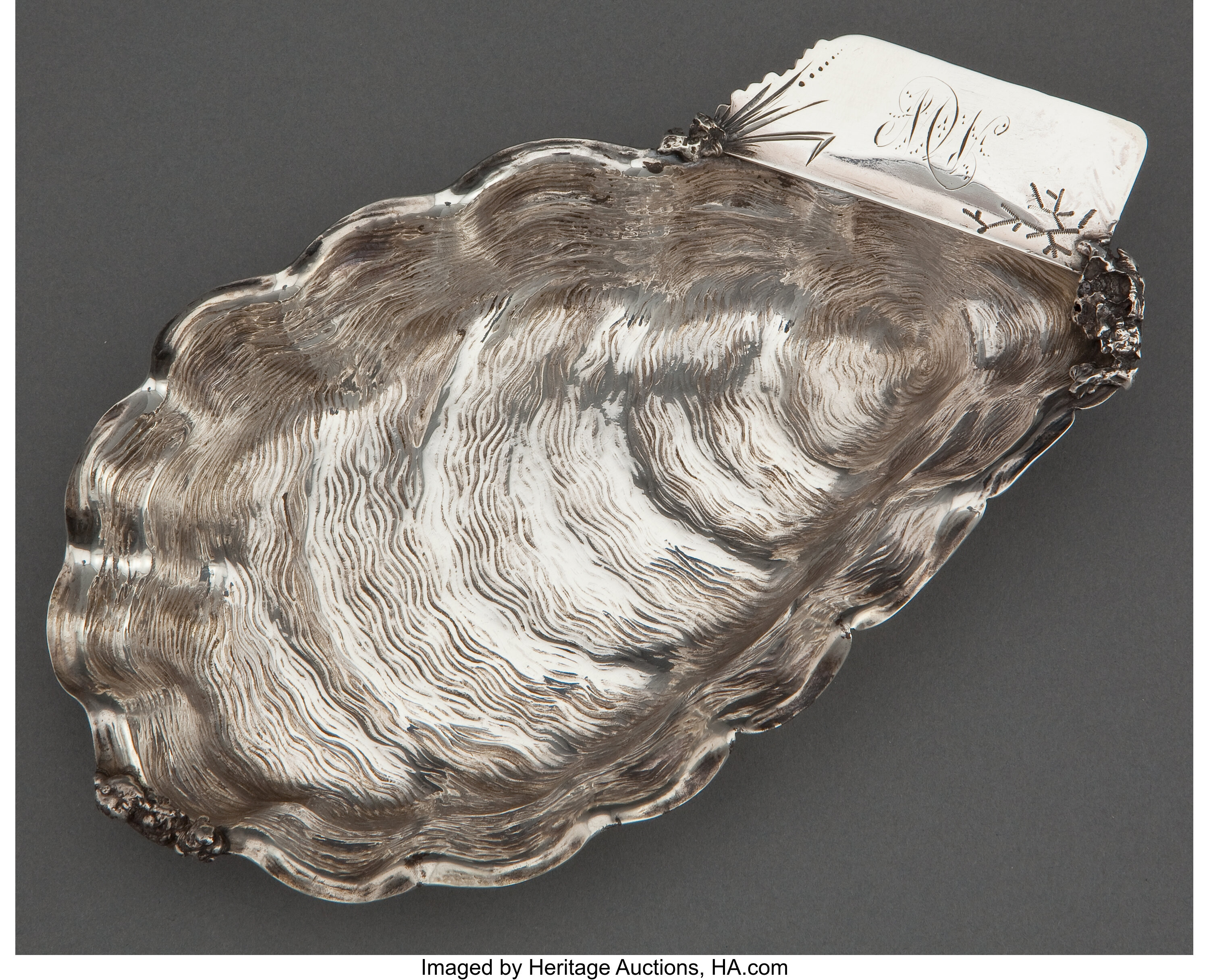 A WOOD & HUGHES SILVER SHELL FORM ALMOND DISH . Wood & Hughes, New ...