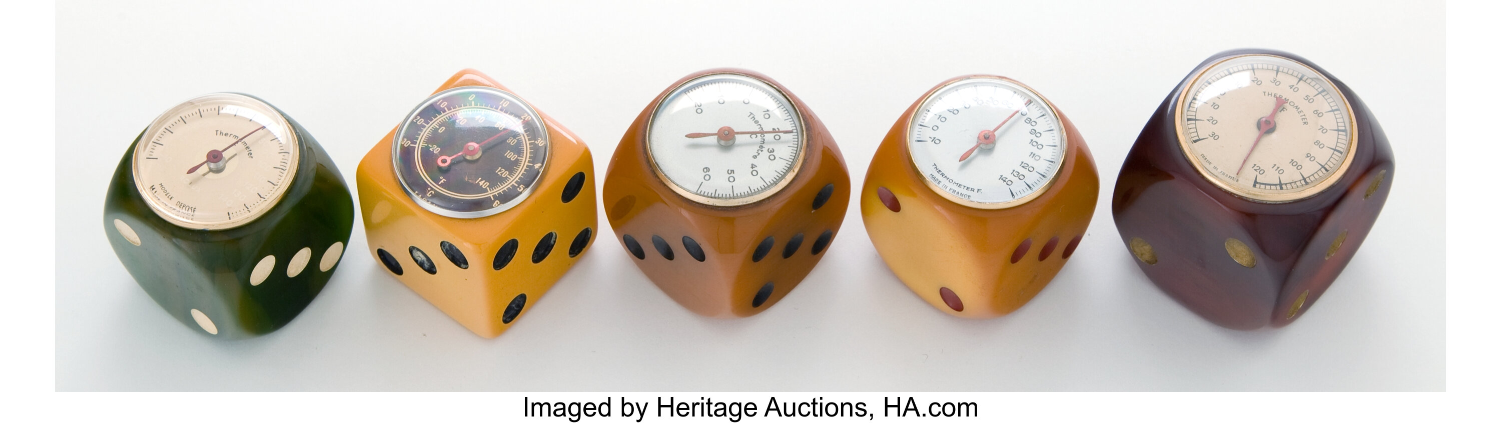 FIVE BAKELITE DICE-FORM THERMOMETERS . Various makers, French, | Lot ...