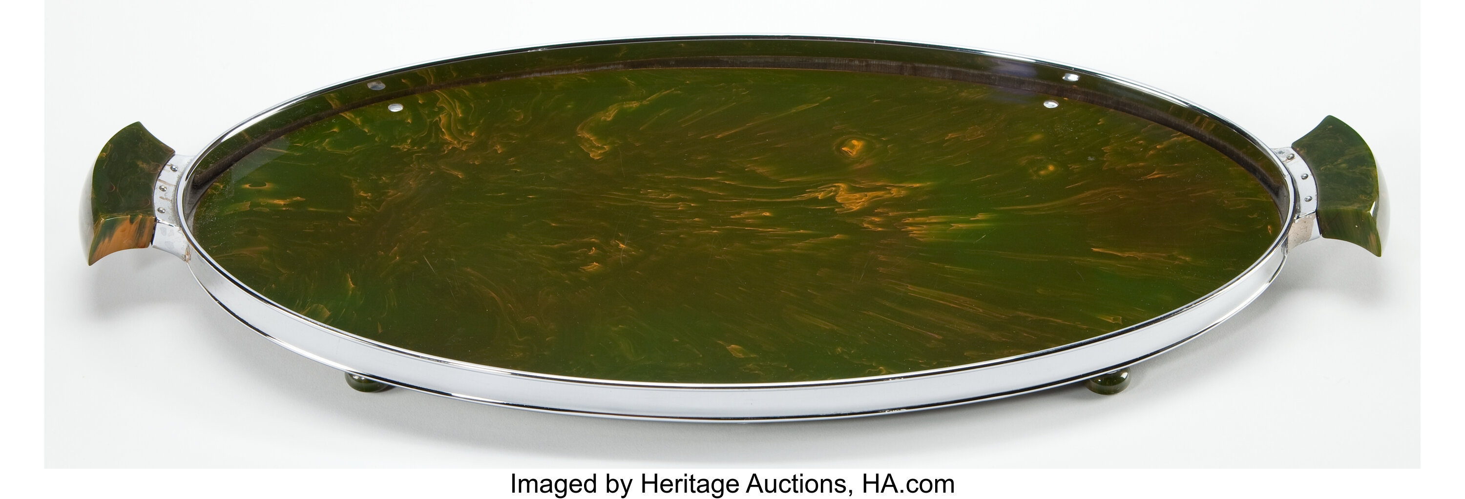 A MANNING-BOWMAN BAKELITE AND CHROMED METAL COCKTAIL TRAY . | Lot ...