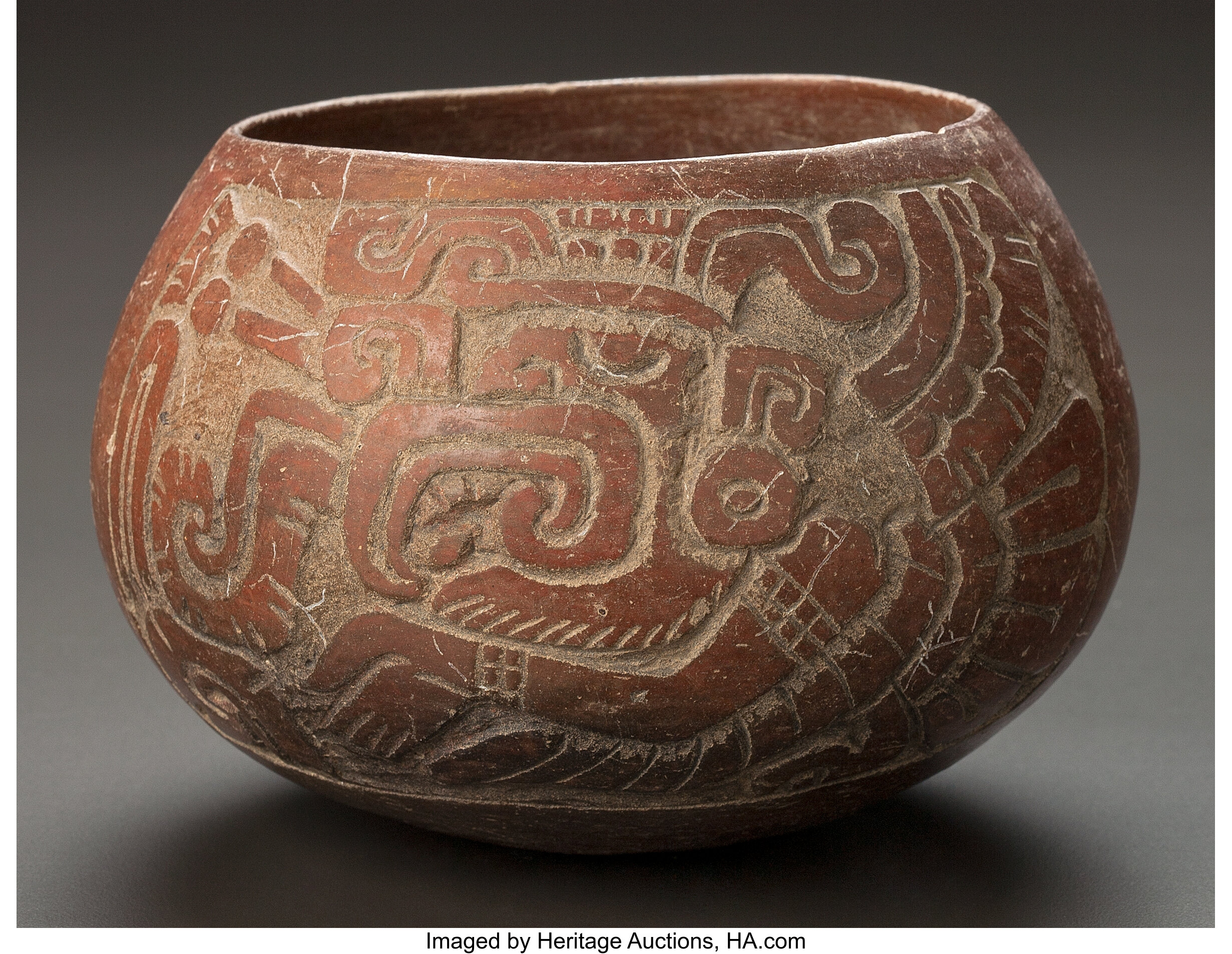 A MAYA BROWNWARE BOWL WITH CARVED PATTERN. c. 600 - 900 AD... | Lot ...